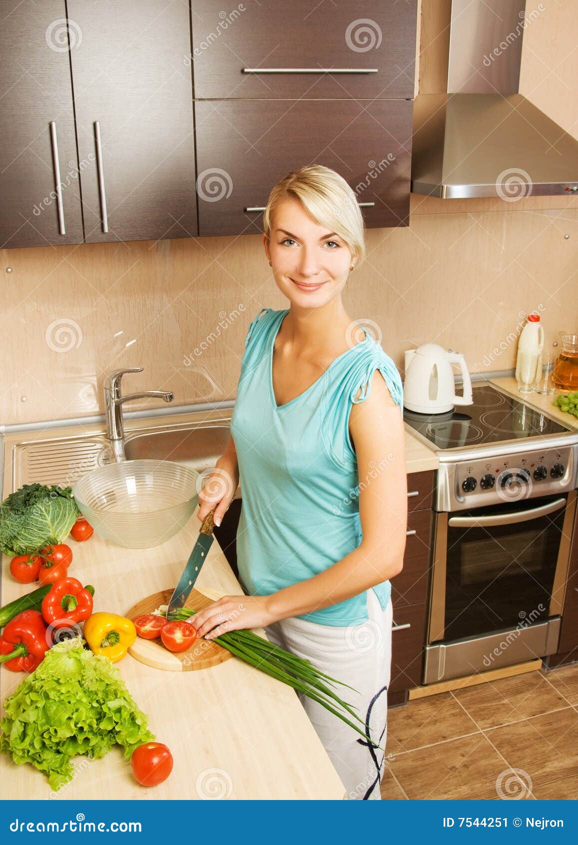 Woman making salad stock image. Image of enjoy, kitchen - 7544251
