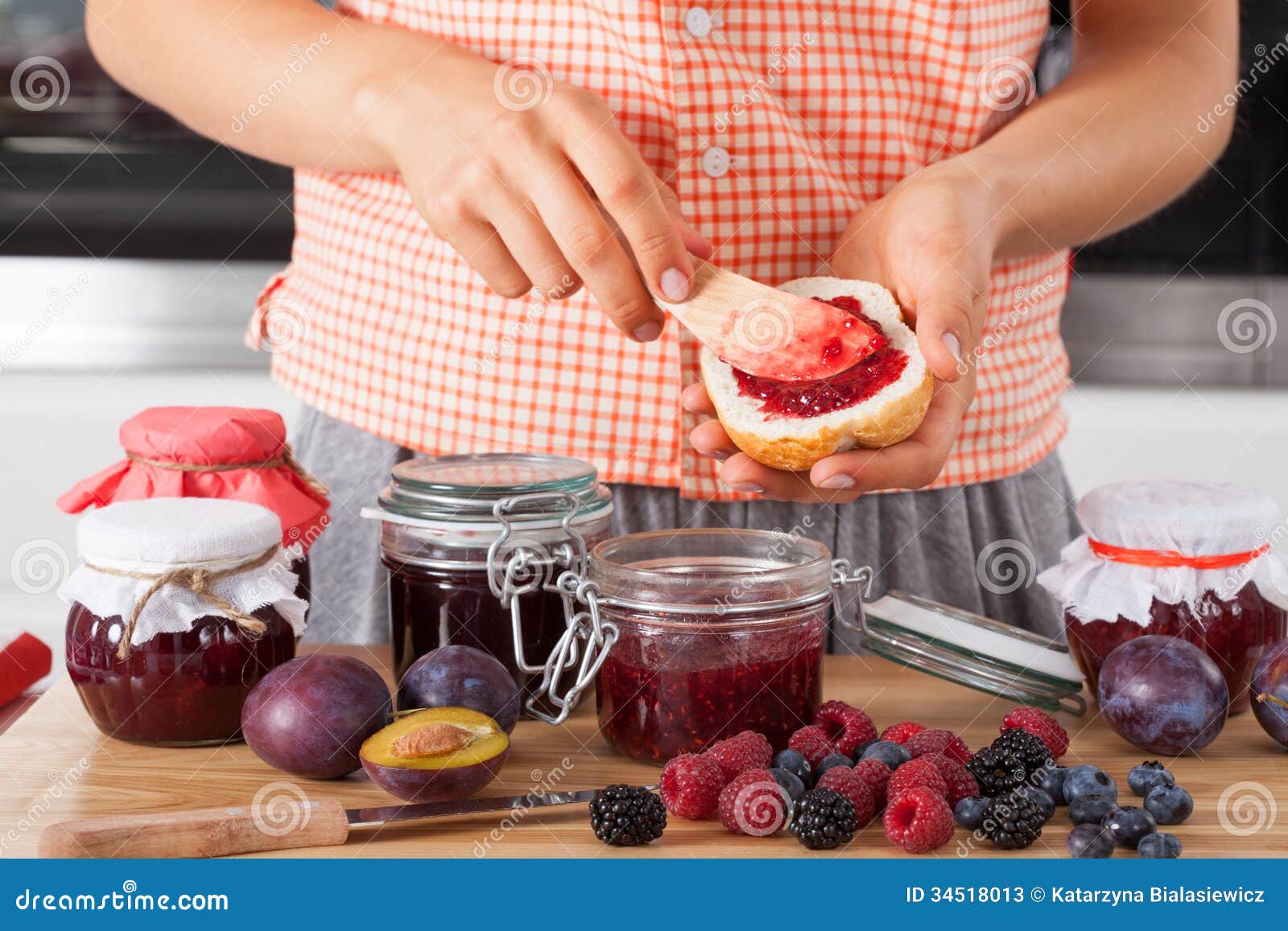 Woman Making a Sandwich with Jam Stock Image - Image of fruit, plums ...