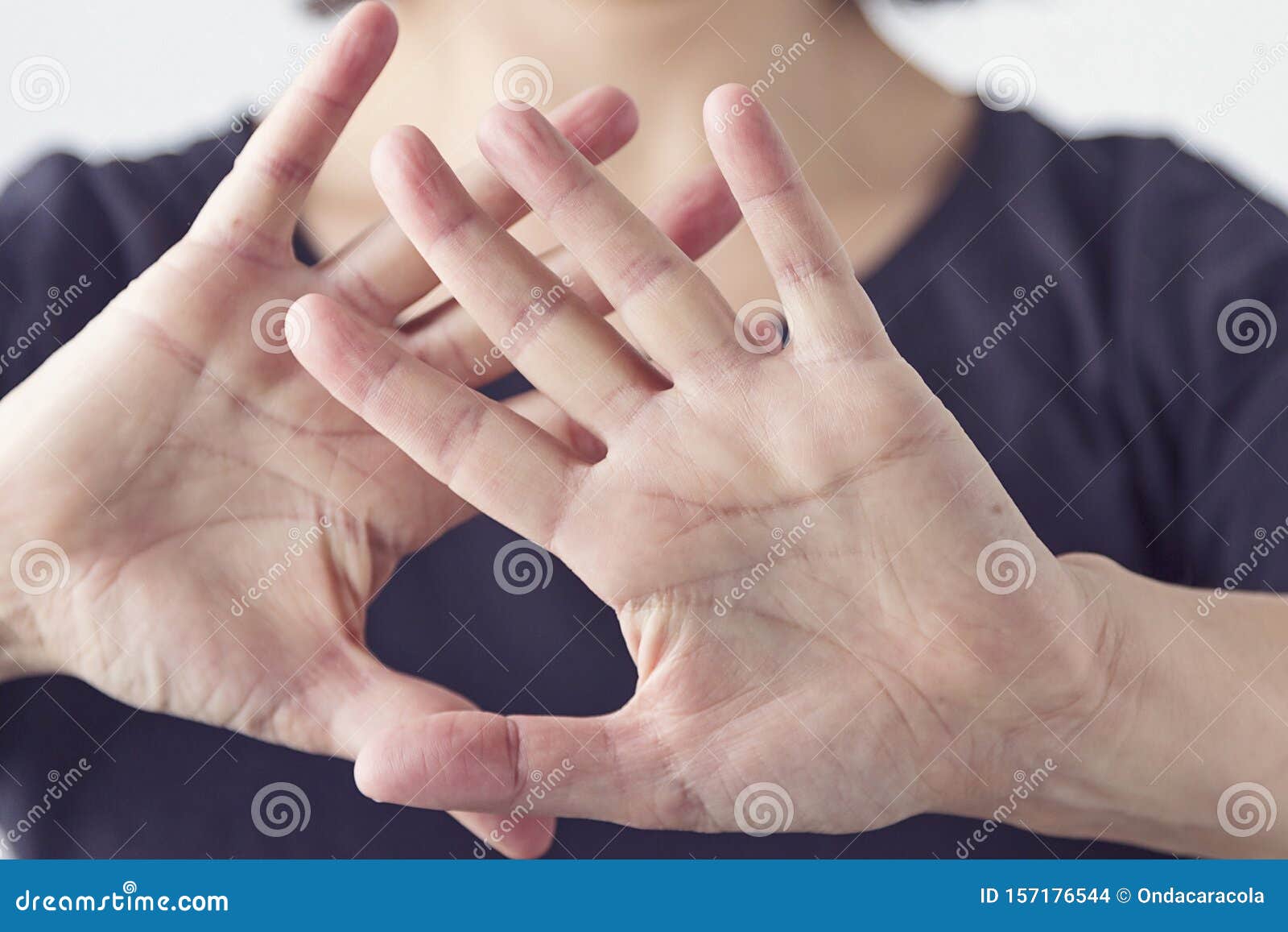 Self defense gesture stock photo. Image of displeased - 157176544