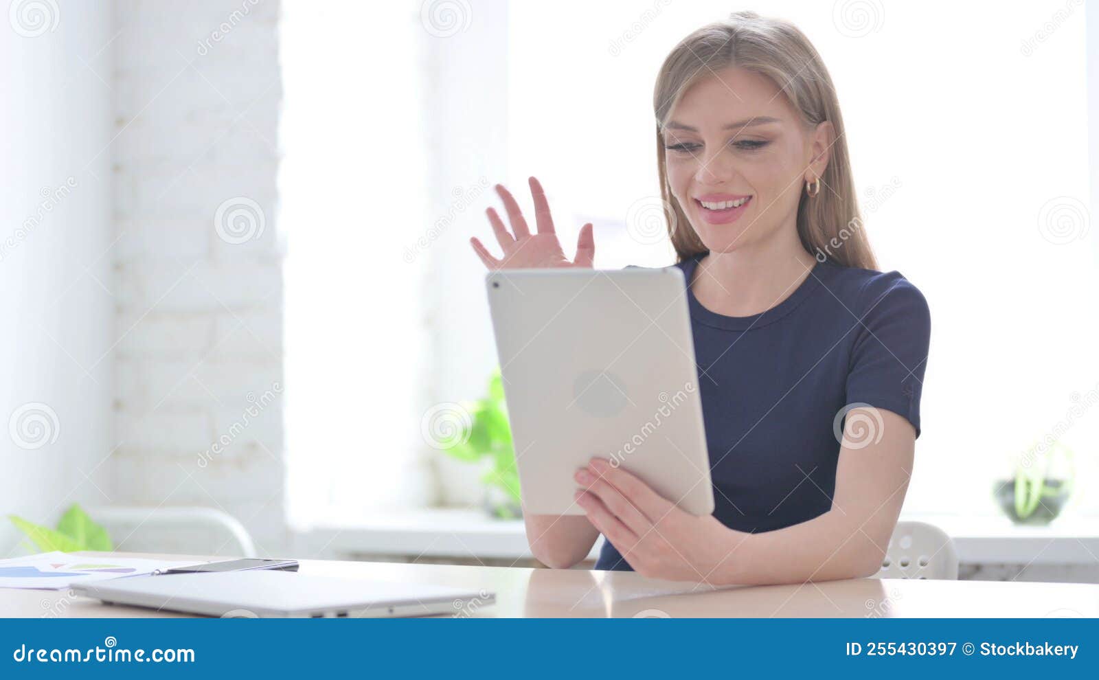 Woman Making Video Call on Tablet in Office Stock Image - Image of ...