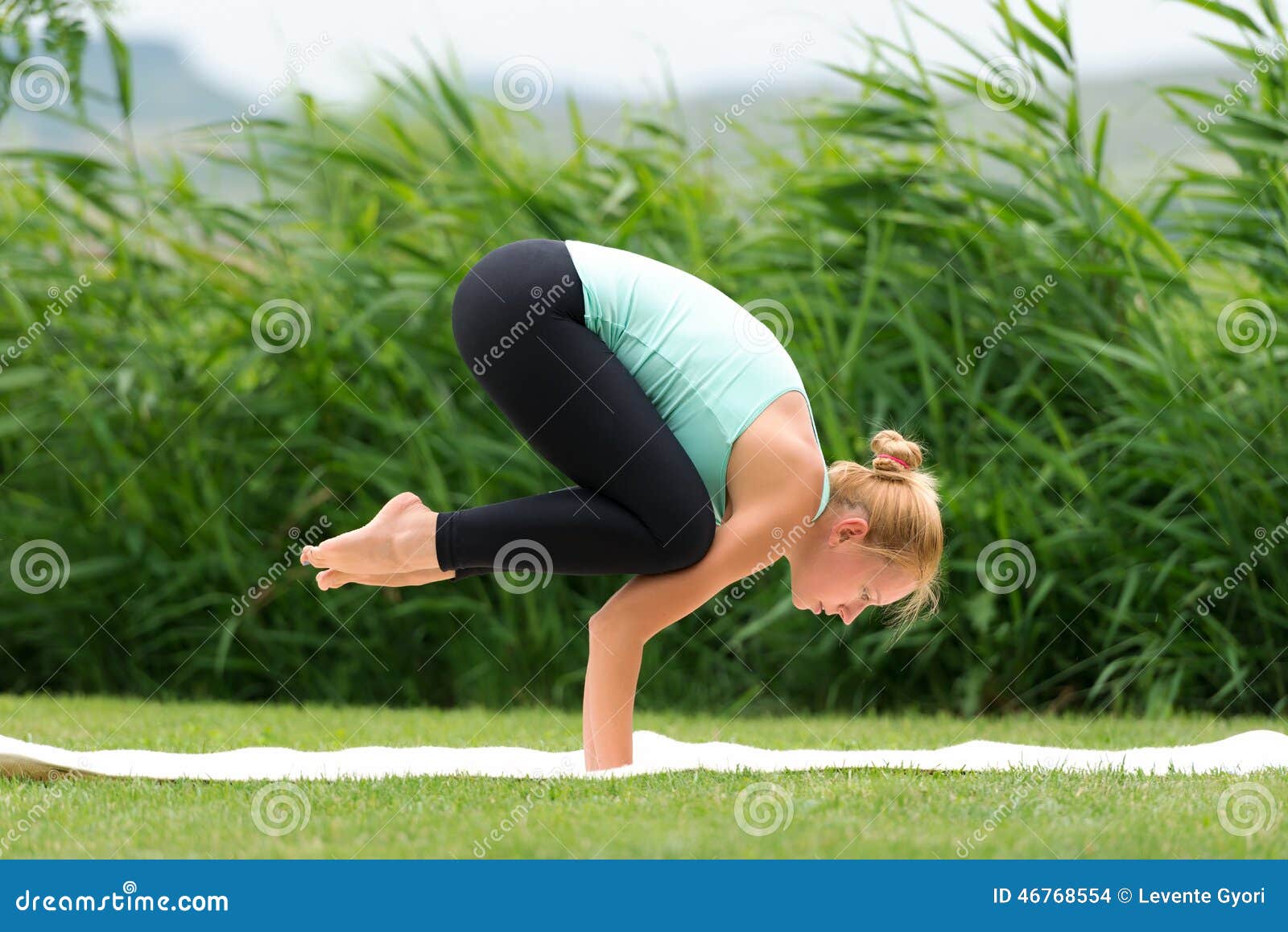 Woman Making Yoga Crow Pose Stock Photo - Image of health, healthy ...