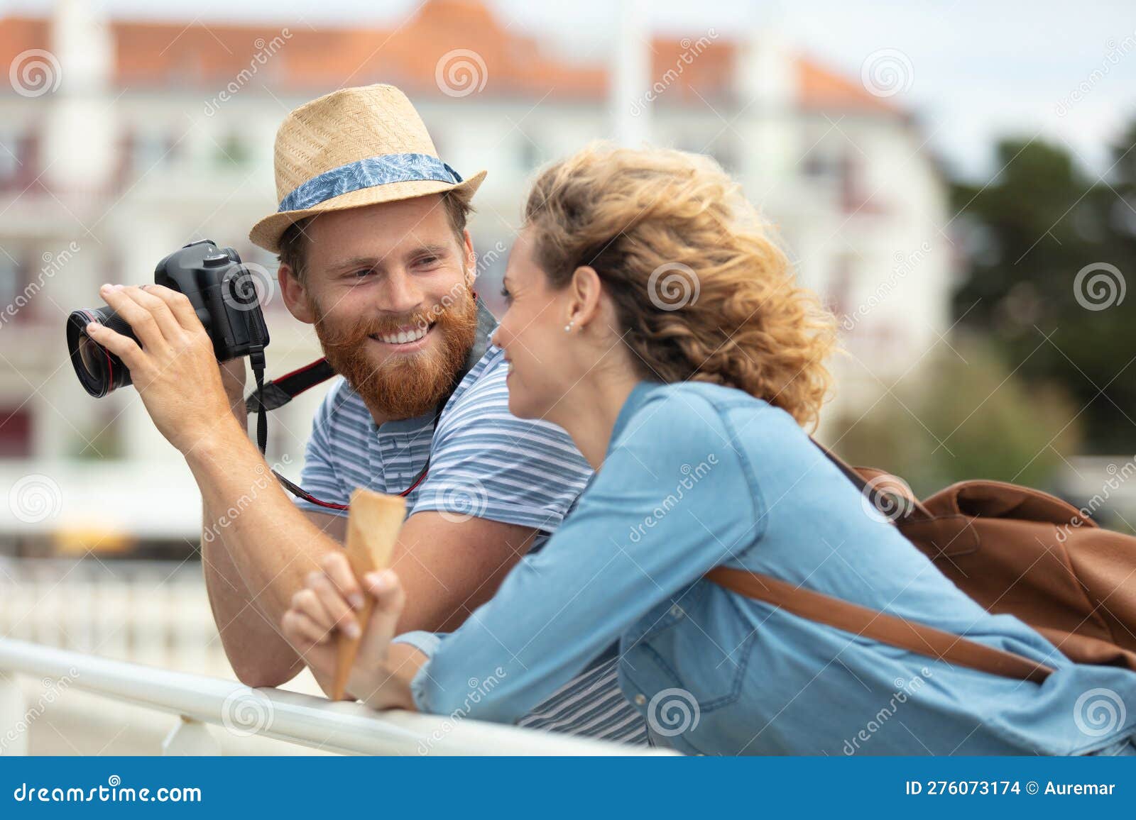 Woman and man with camera stock photo. Image of couples - 276073174