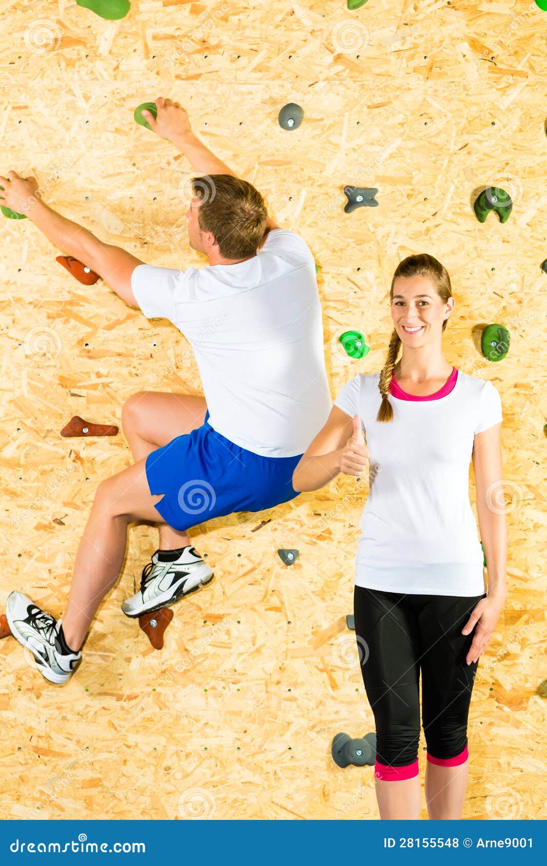 Woman and Man Climbing at Climbing Wall Stock Photo - Image of power ...