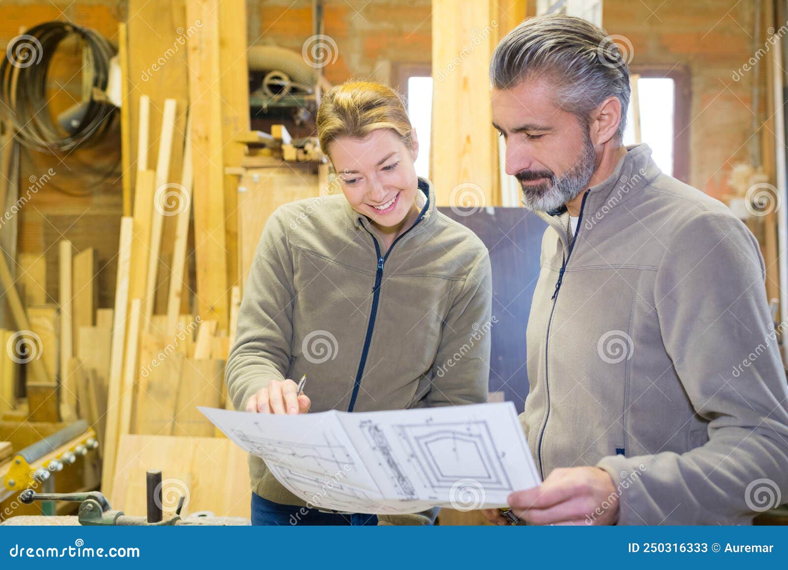 Woman and Man Doing Carpentry in Workshop Stock Image - Image of ...