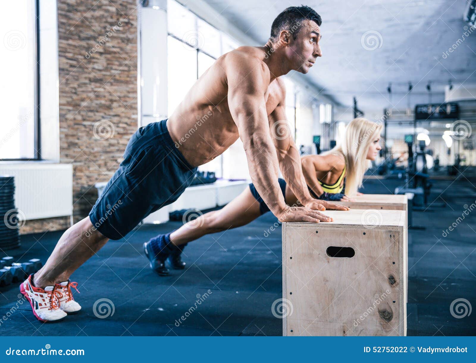 Woman and Man Doing Push Ups at Gym Stock Photo - Image of stretch ...