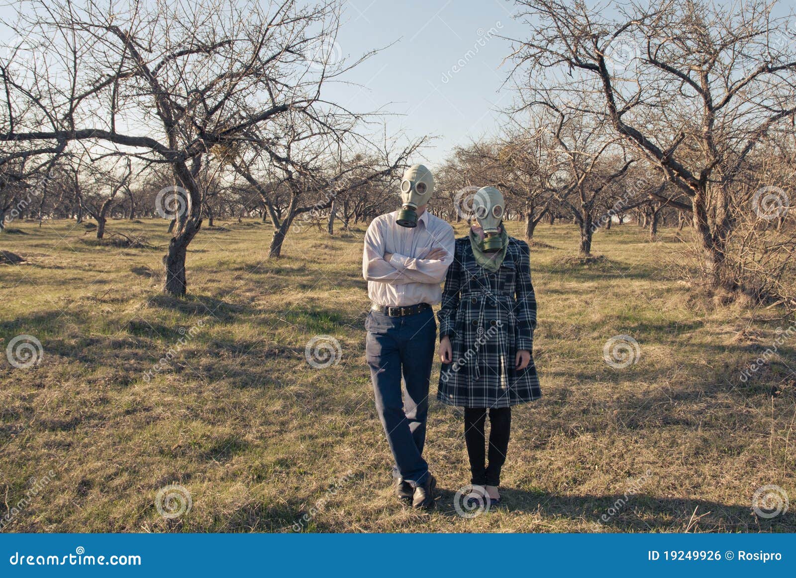 Woman and Man in Gas Masks in the Forest Stock Photo - Image of earth ...
