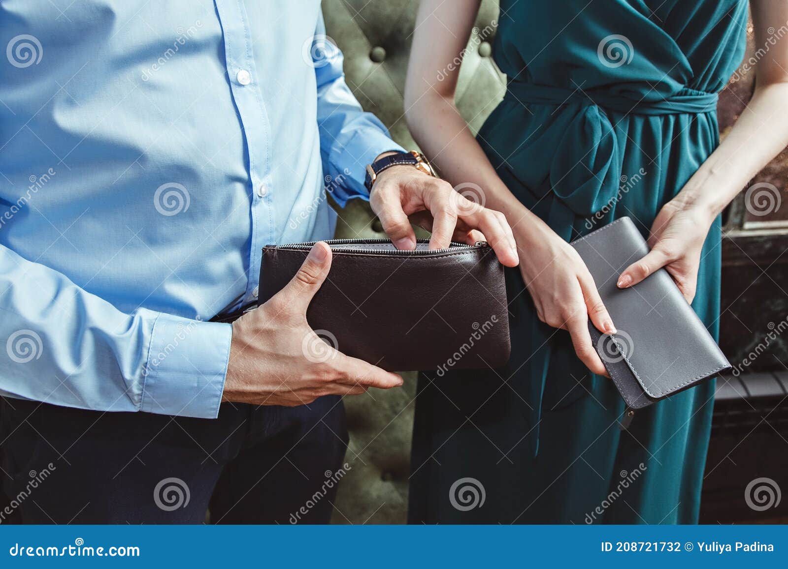 A Woman and a Man Hold Purses in Their Hands Stock Photo - Image of ...