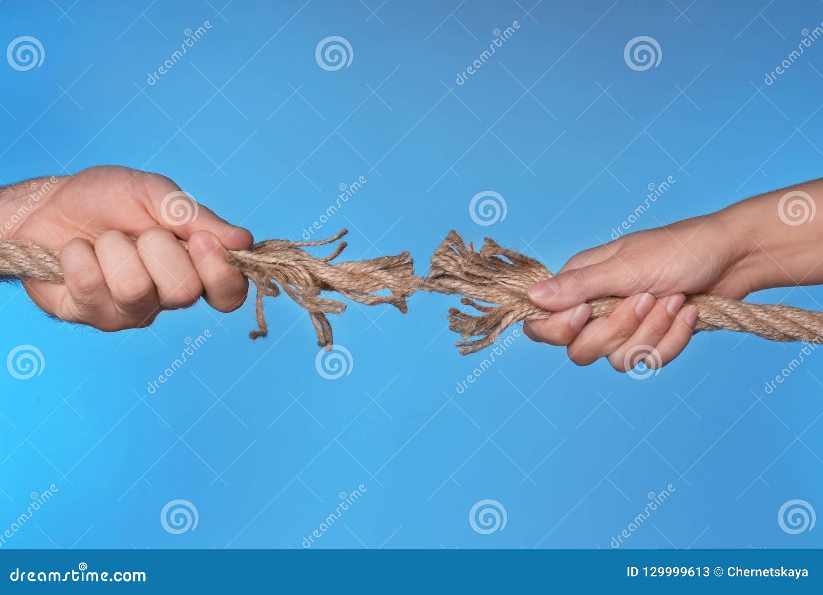 Woman and Man Pulling Damaged Rope on Color Background Stock Image ...