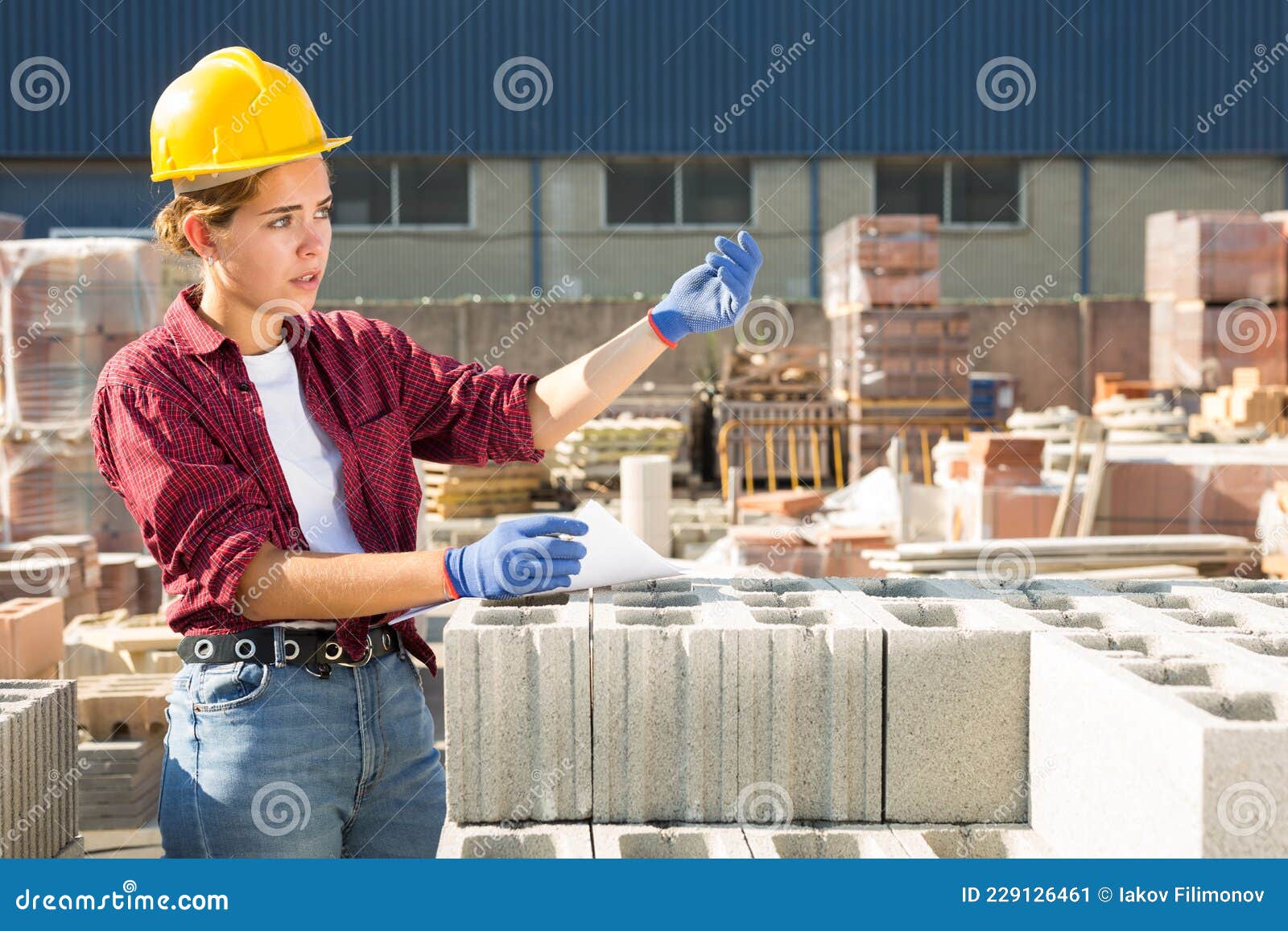 Woman Manager Leads the Accounting of Materials at Construction Site ...