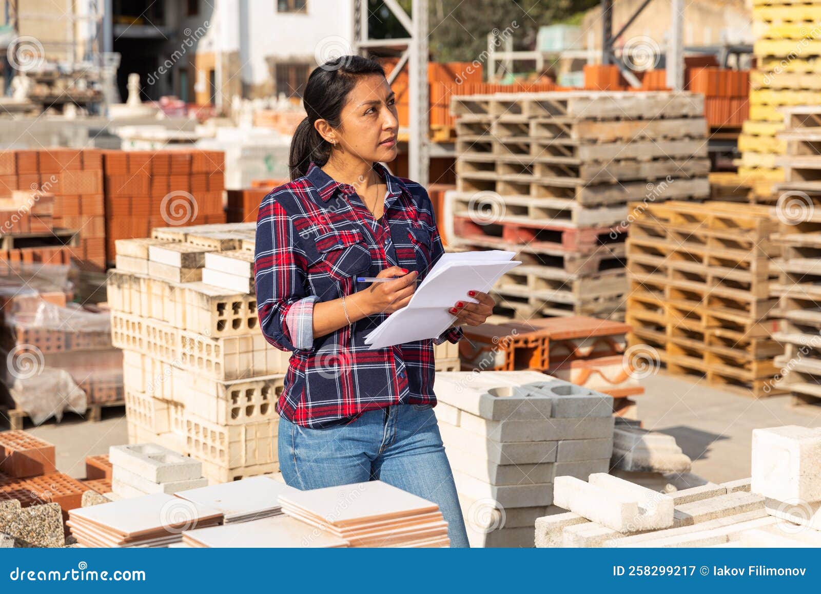 Woman Manager Leads the Accounting of Materials at Construction Site ...