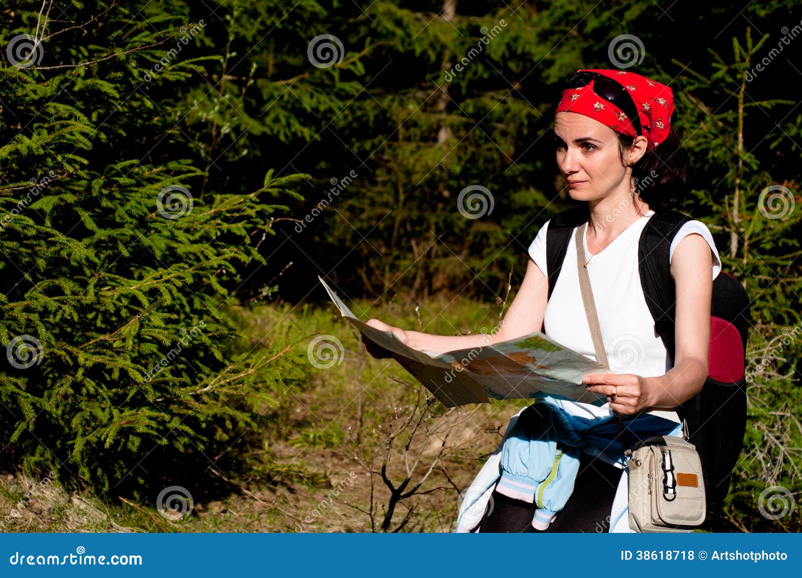 Woman with a map in forest stock photo. Image of forest - 38618718