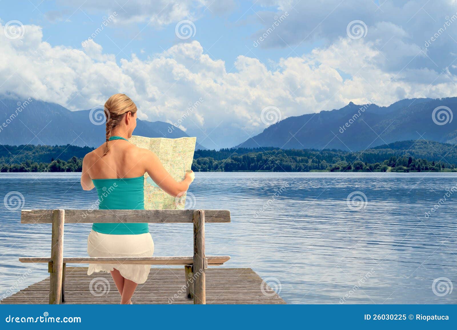 Woman with map on a lake stock image. Image of reading - 26030225