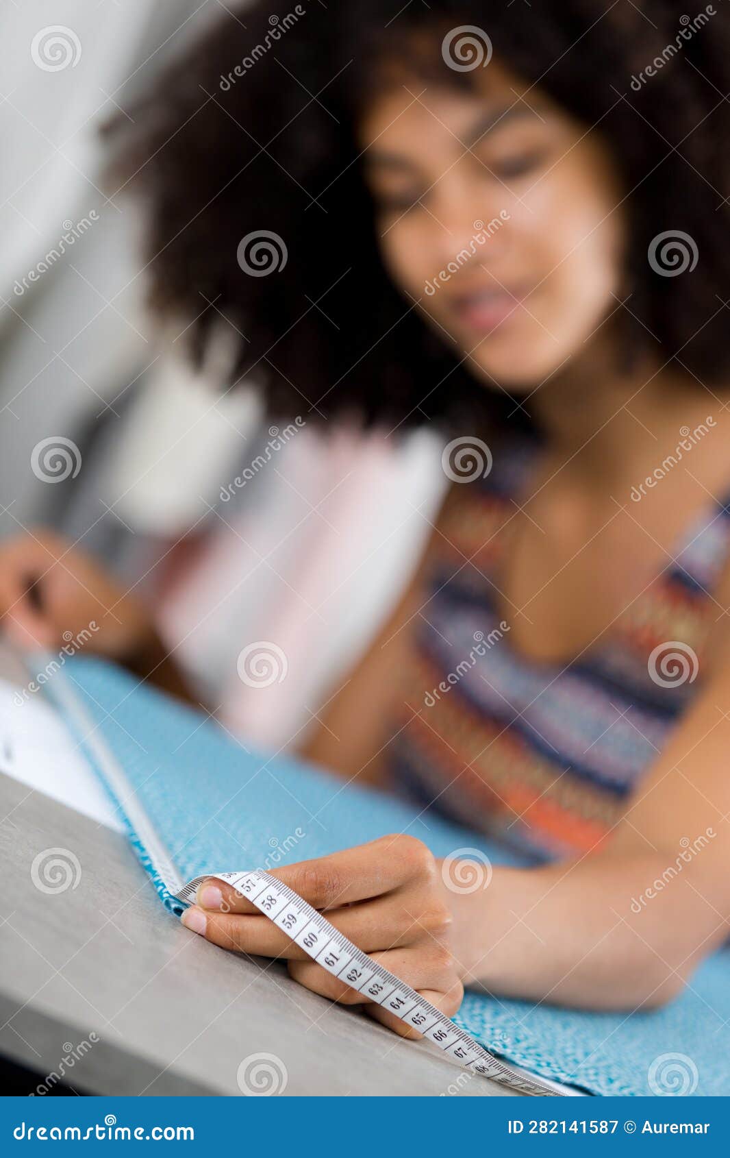 Woman marking out pattern stock image. Image of indoor - 282141587