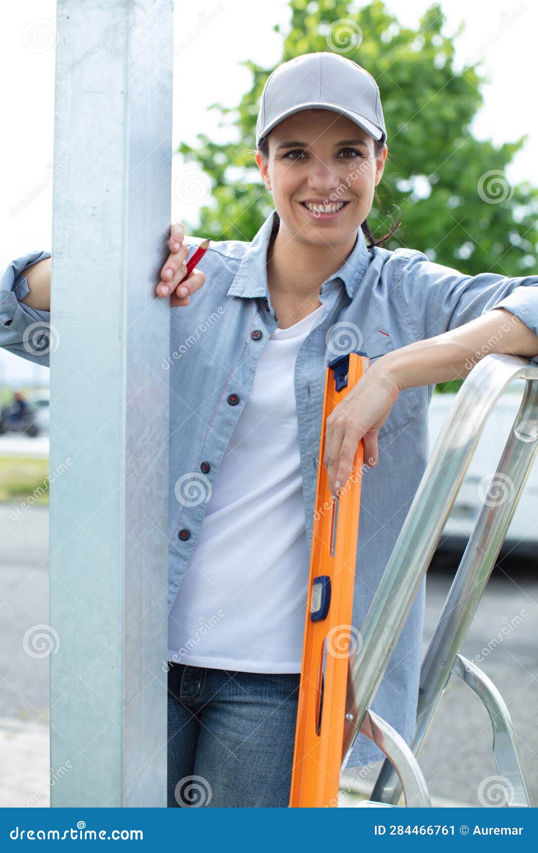 Woman with Measure Level Tool on Construction Site Stock Image - Image ...
