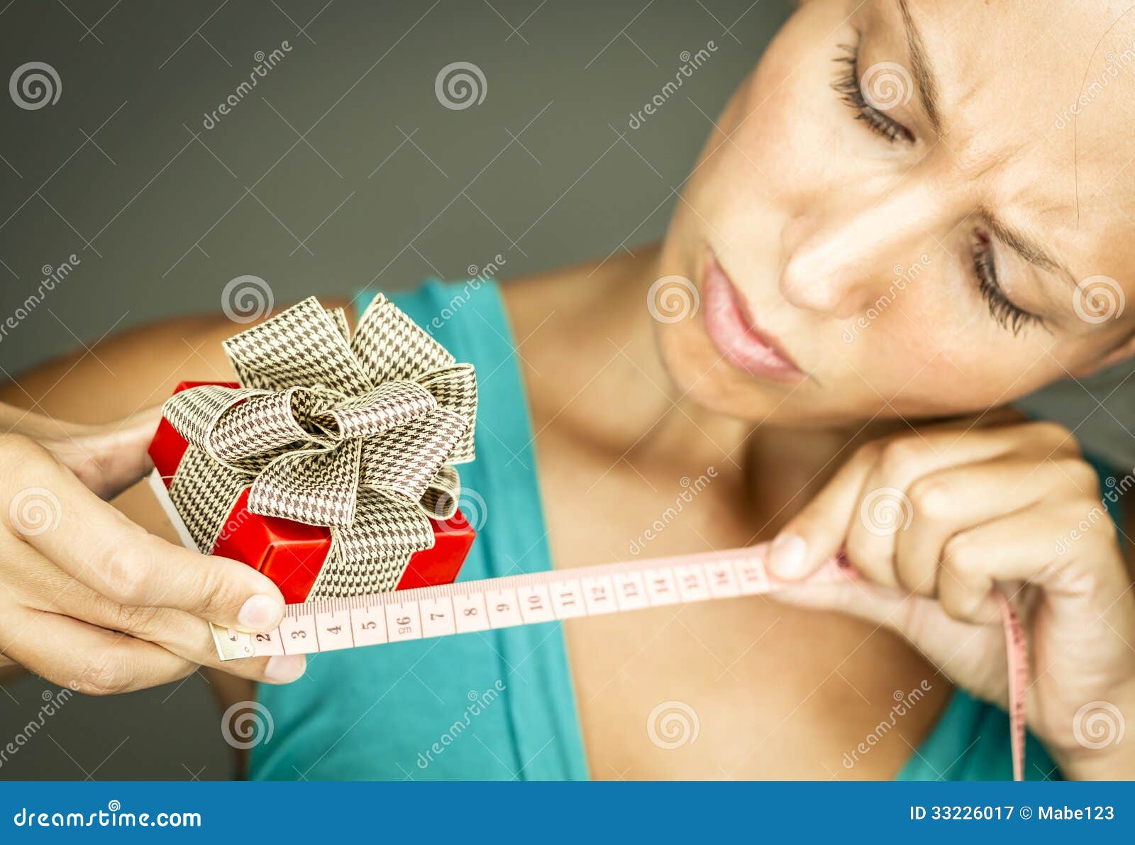 Woman measures a gift stock image. Image of anniversary - 33226017