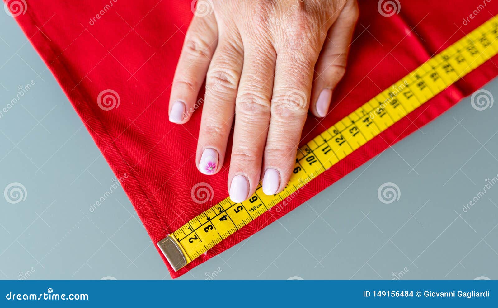 Woman Measuring a Fabric by Hand with the Meter Stock Photo - Image of ...