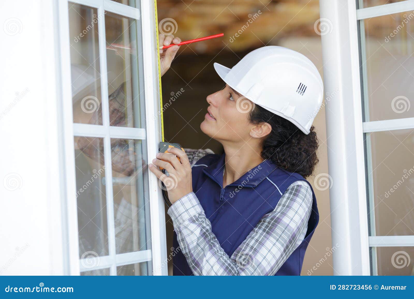 Woman measuring window stock photo. Image of tape, house - 282723456