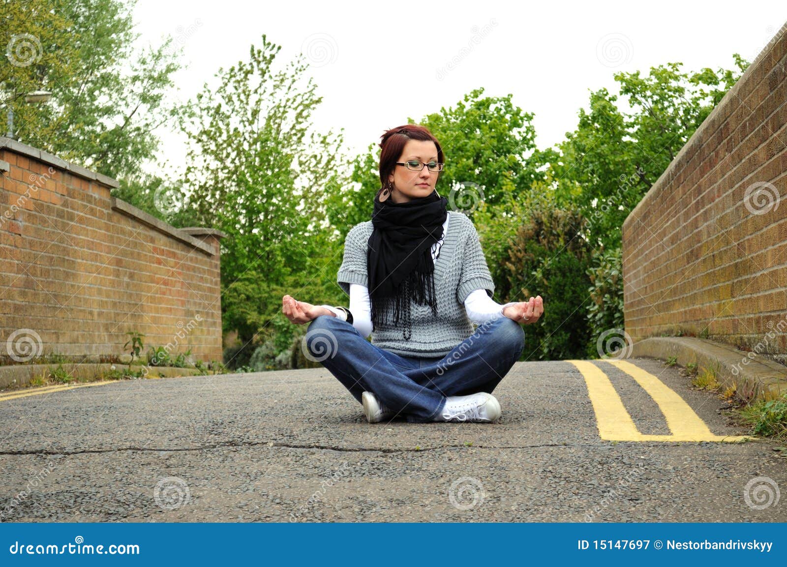 Woman meditating on bridge stock image. Image of harmonious - 15147697