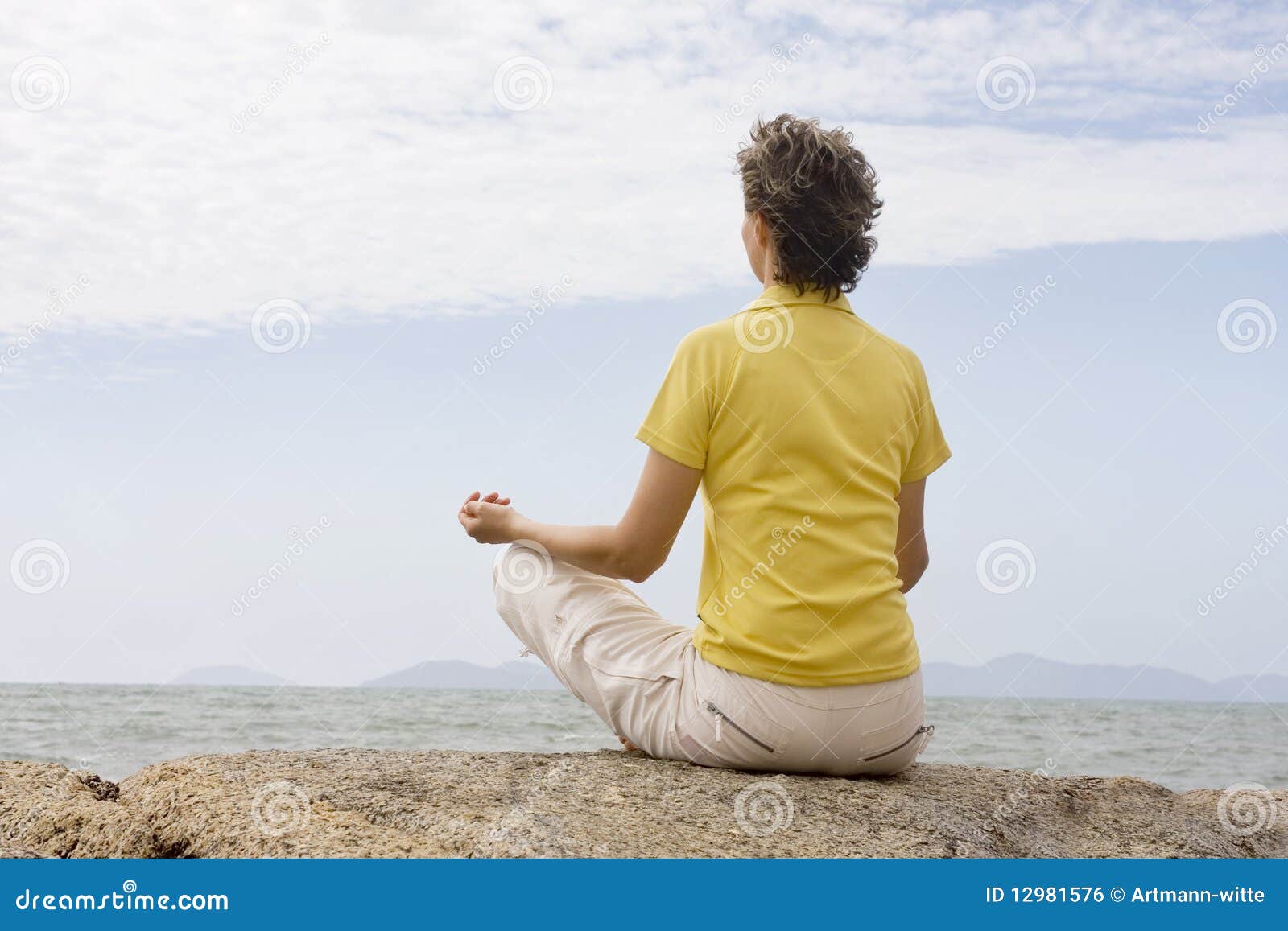 Woman Meditating at the Sea Stock Photo - Image of natural, calm: 12981576