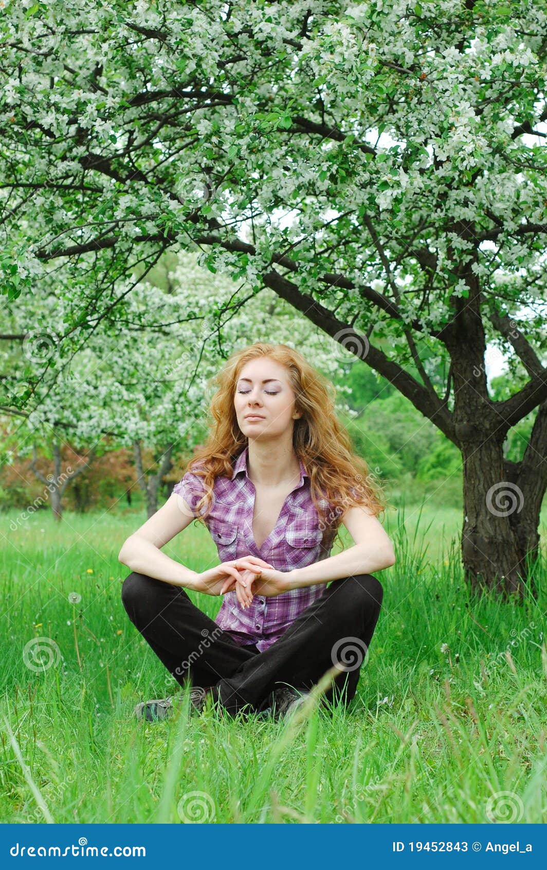 Woman Meditating Under Blooming Tree Stock Image - Image of sensuality ...