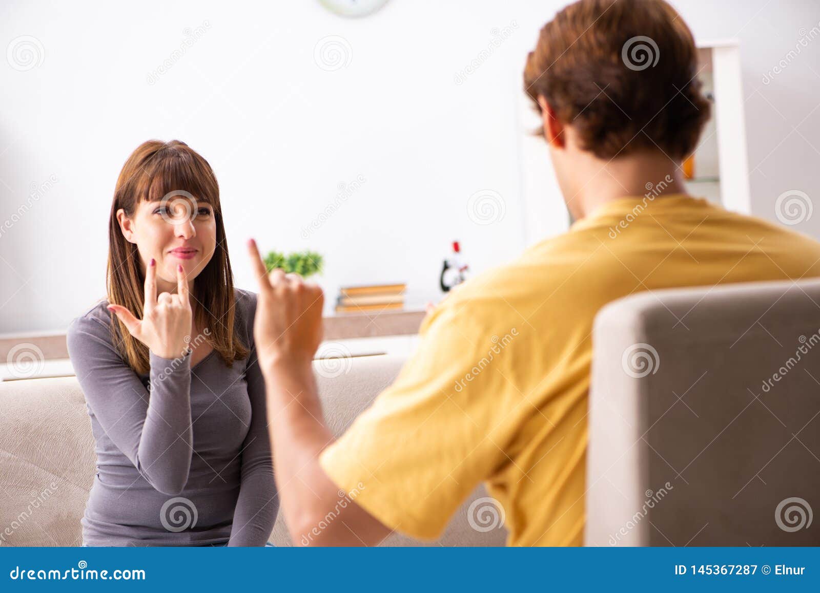 The Woman and Man Learning Sign Language Stock Image - Image of hearing ...