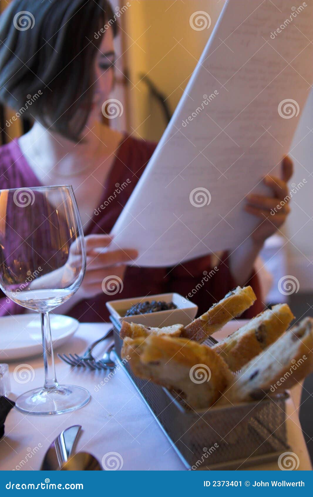 Woman with menu stock image. Image of upscale, decide - 2373401