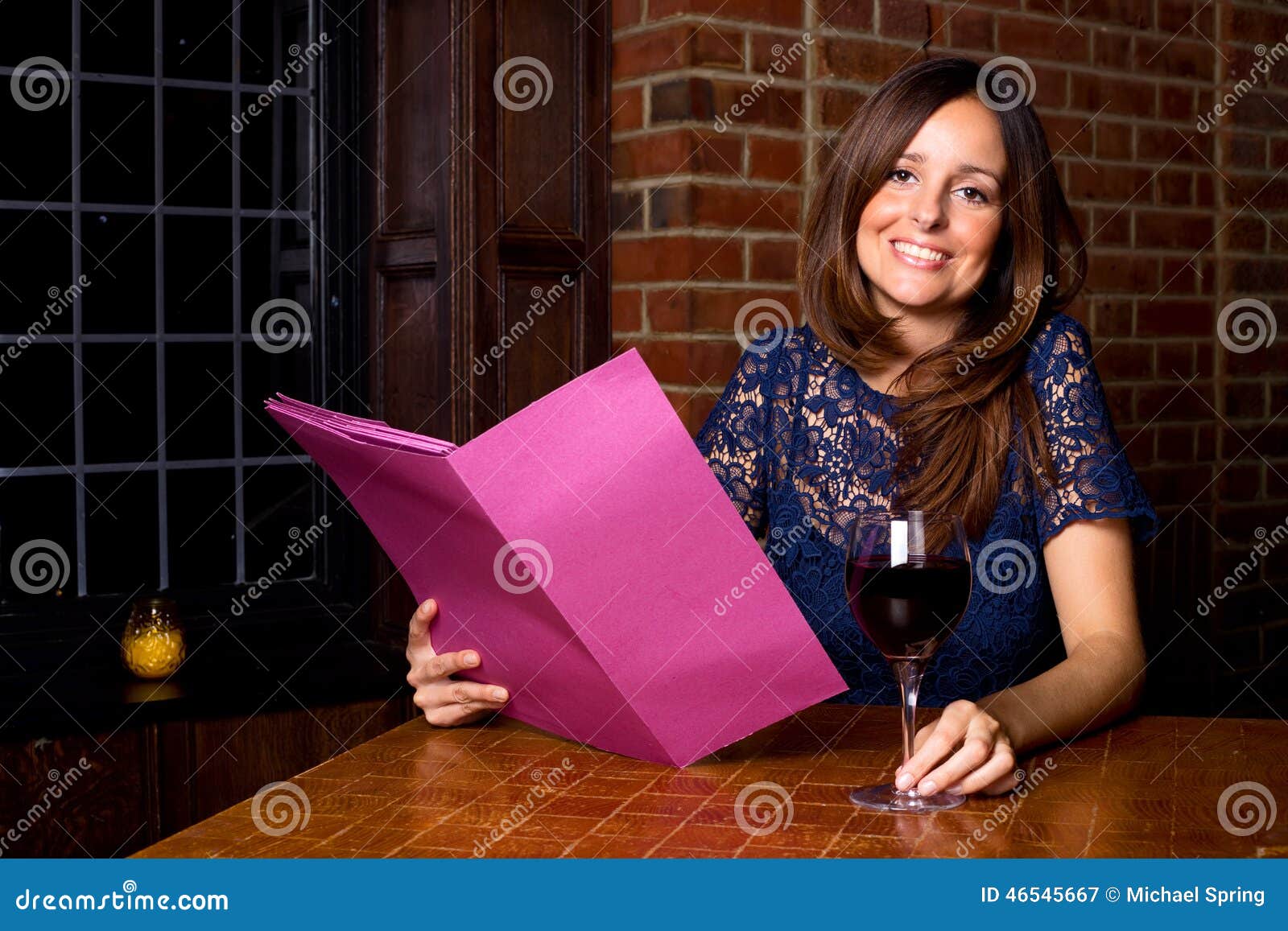 Woman with a menu stock image. Image of girl, lady, customer - 46545667