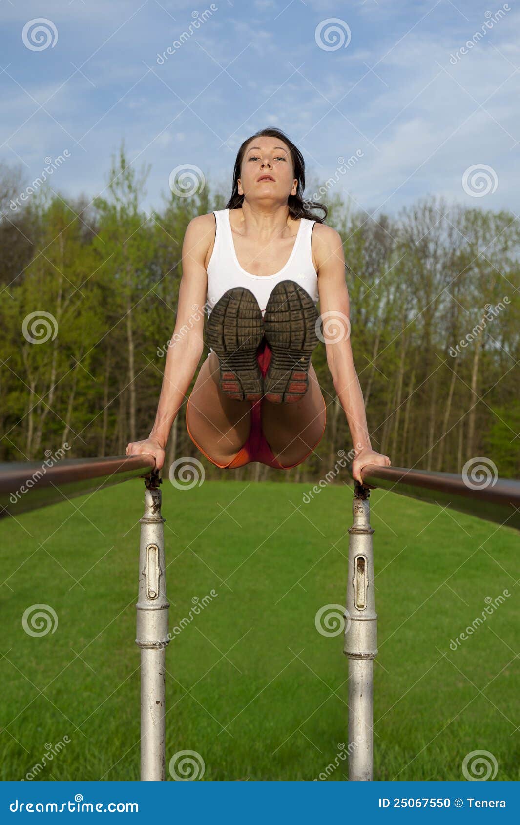 Woman on Metal Bar Doing Exercises Stock Photo - Image of shape ...