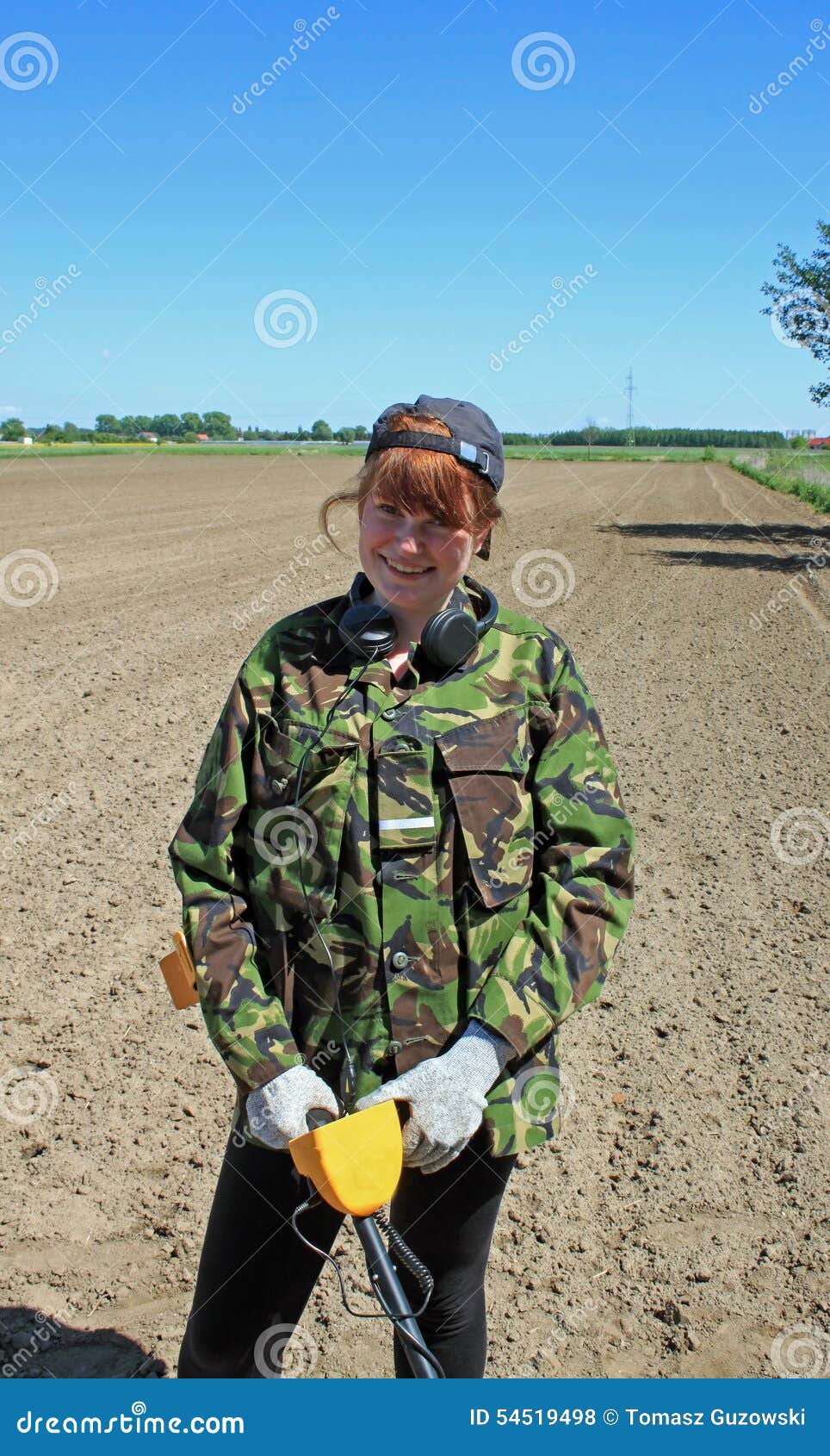 Woman with metal detector stock photo. Image of equipment - 54519498