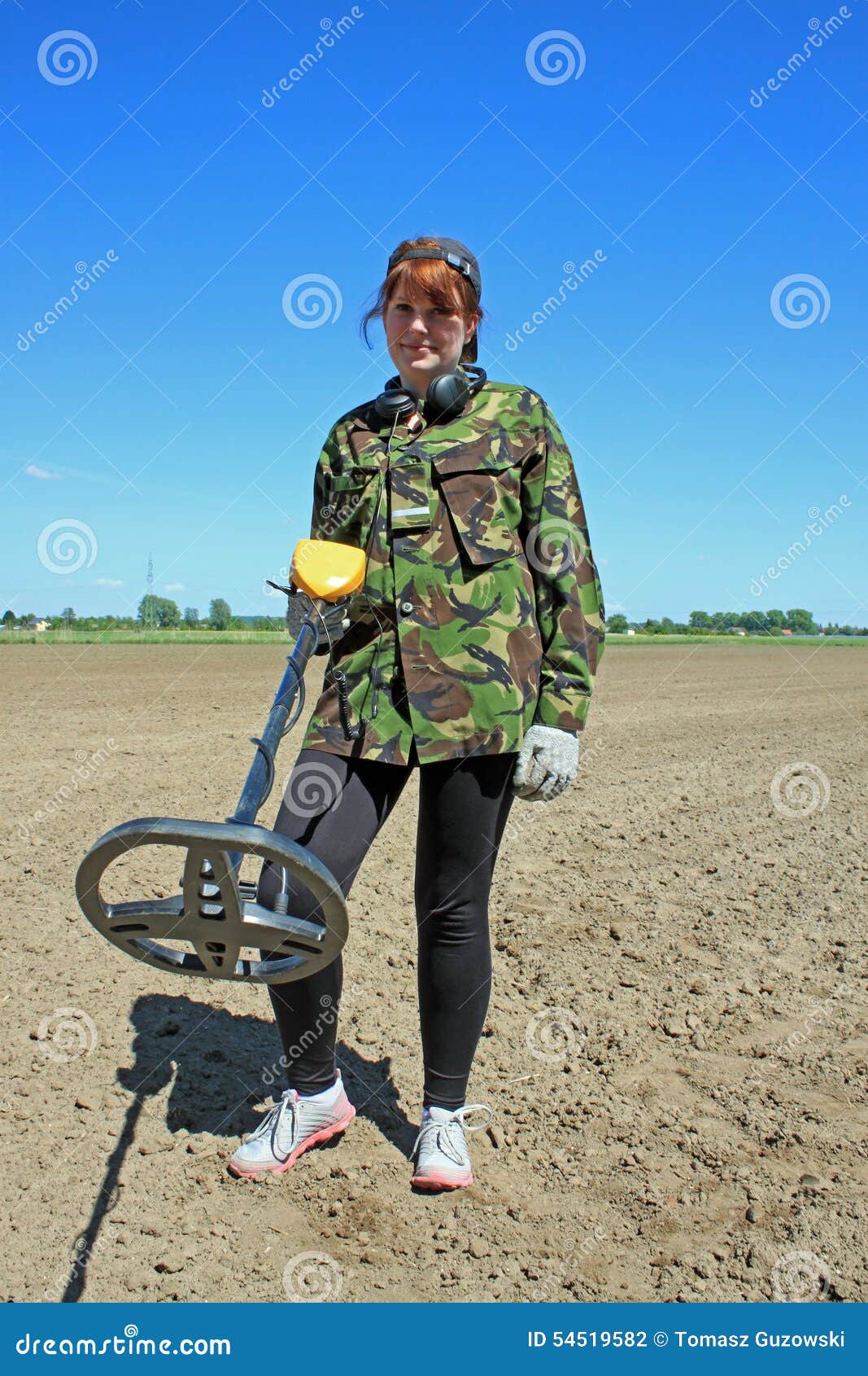 Woman with metal detector stock photo. Image of adventure - 54519582
