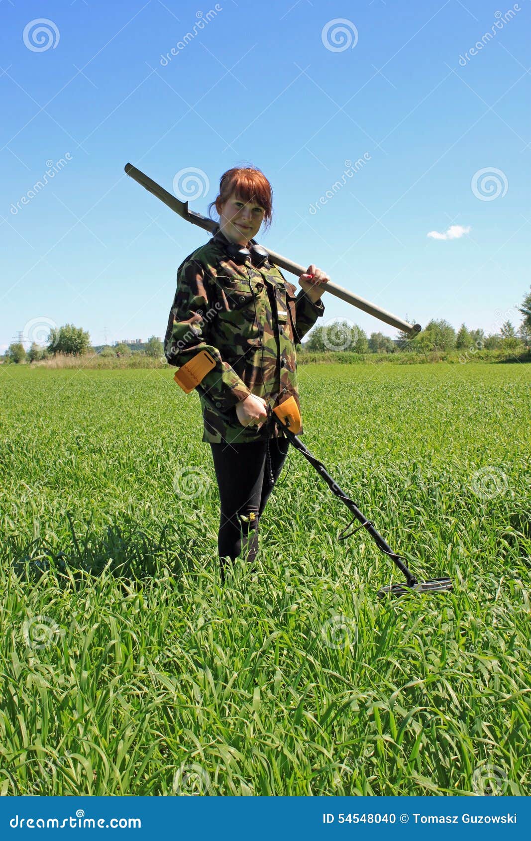 Woman with metal detector stock photo. Image of holding - 54548040