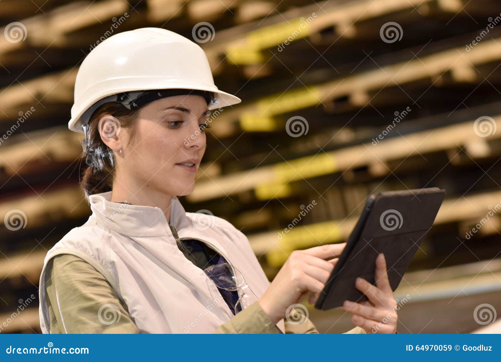 Woman Metal Worker Using Tablet Stock Image - Image of checking ...