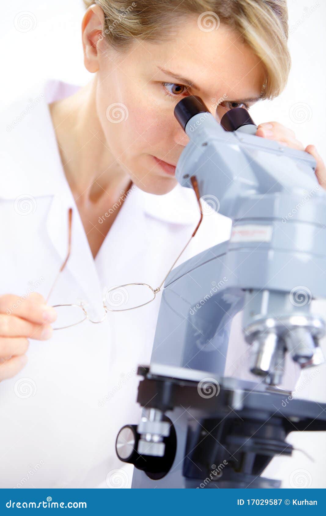 Woman with microscope stock image. Image of laboratory - 17029587