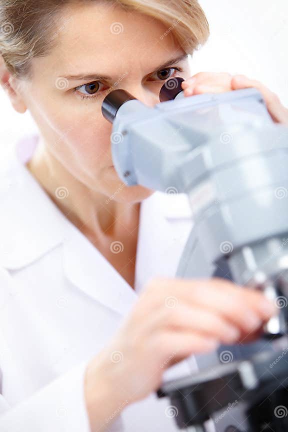 Woman with microscope stock image. Image of observation - 17029597