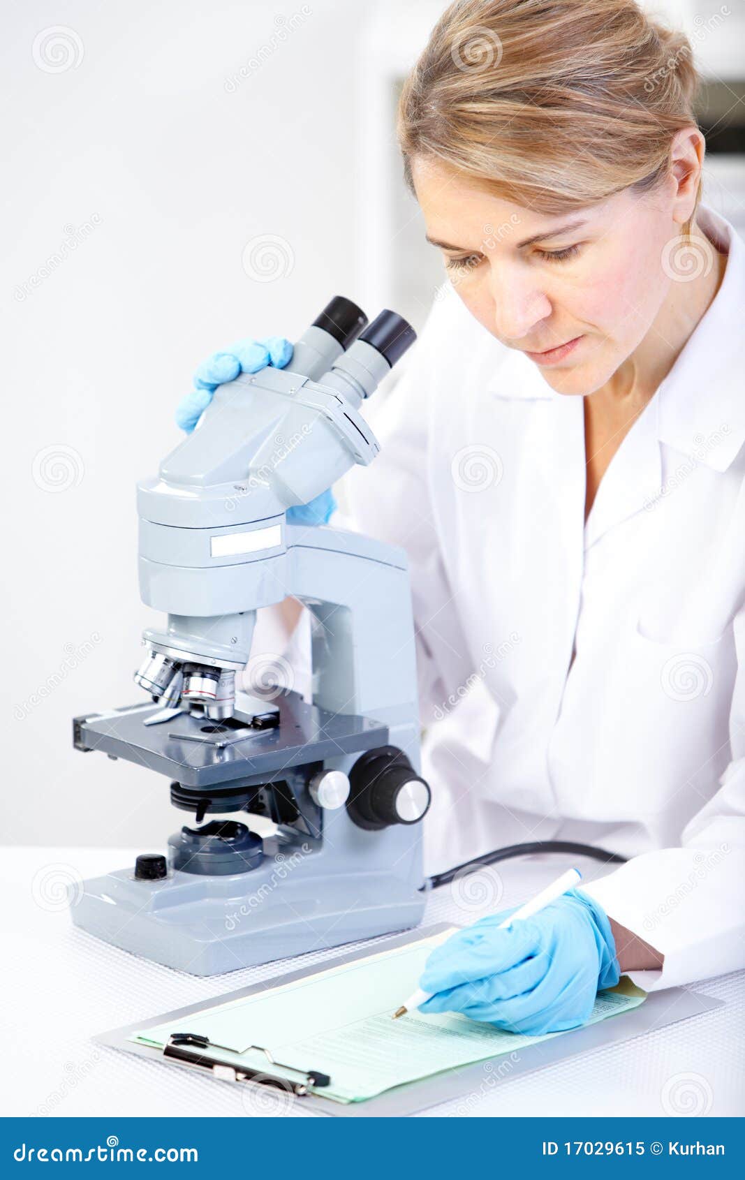 Woman with microscope stock image. Image of observation - 17029615