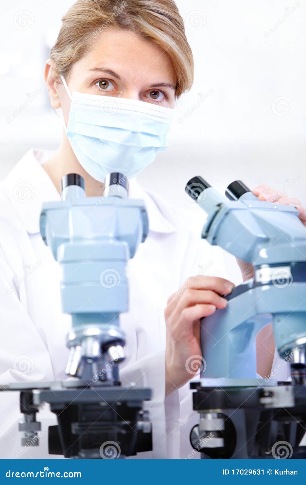 Woman with microscope stock image. Image of instrument - 17029631