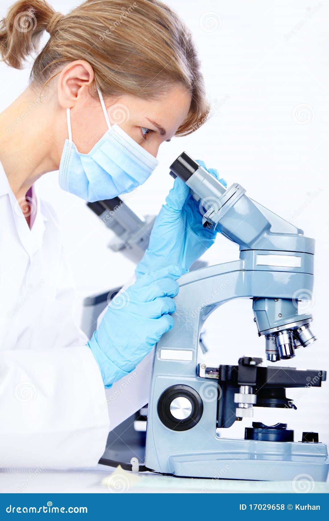 Woman with microscope stock photo. Image of clinic, caucasian - 17029658