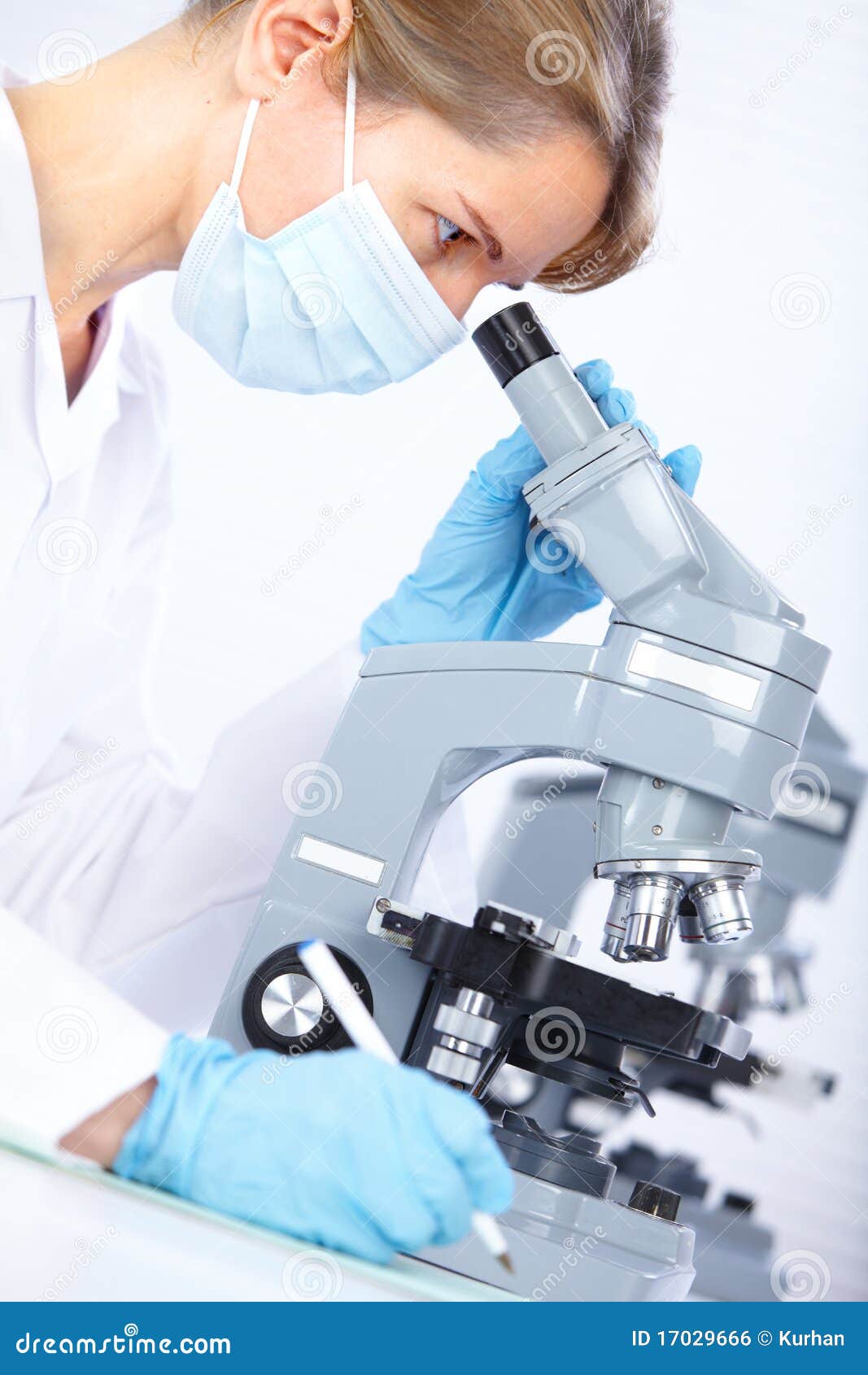 Woman with microscope stock photo. Image of chemist, lady - 17029666