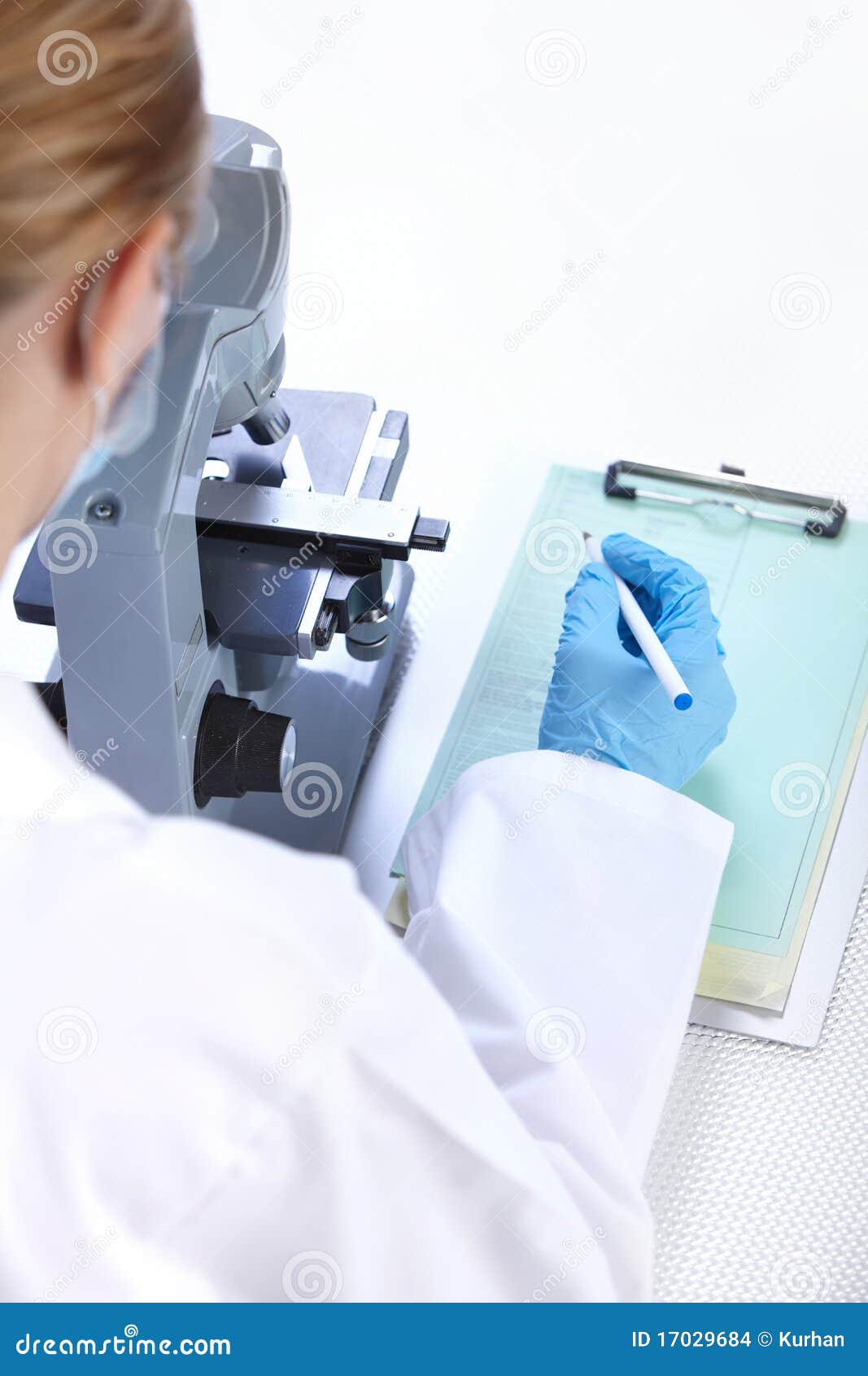 Woman with microscope stock photo. Image of look, clinic - 17029684