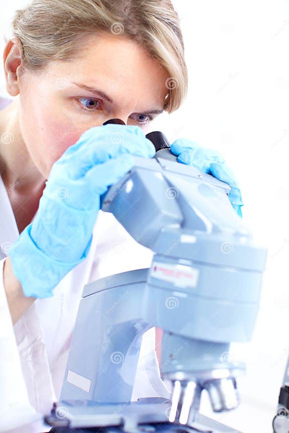 Woman with microscope stock image. Image of microbiology - 17029707