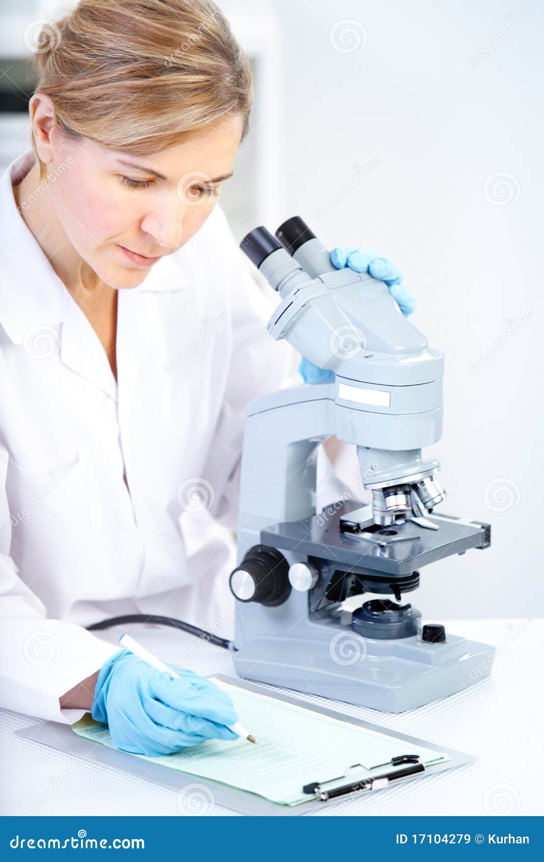 Woman with microscope stock image. Image of clinic, health - 17104279