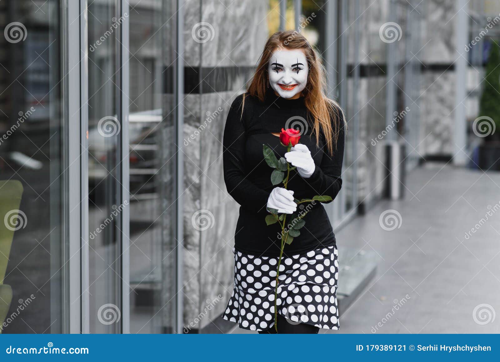 Woman Mime with Red RoseThe Girl with Makeup of the Mime. Improvisation ...