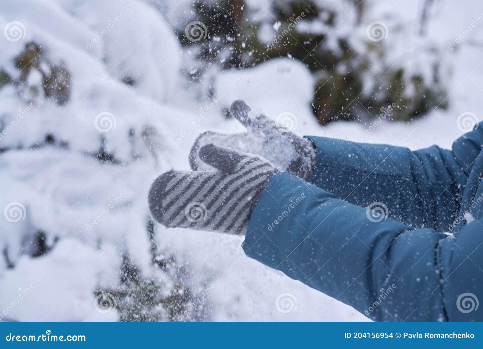 Woman in Mittens Claps Hands in the Snow. Stock Photo - Image of ...