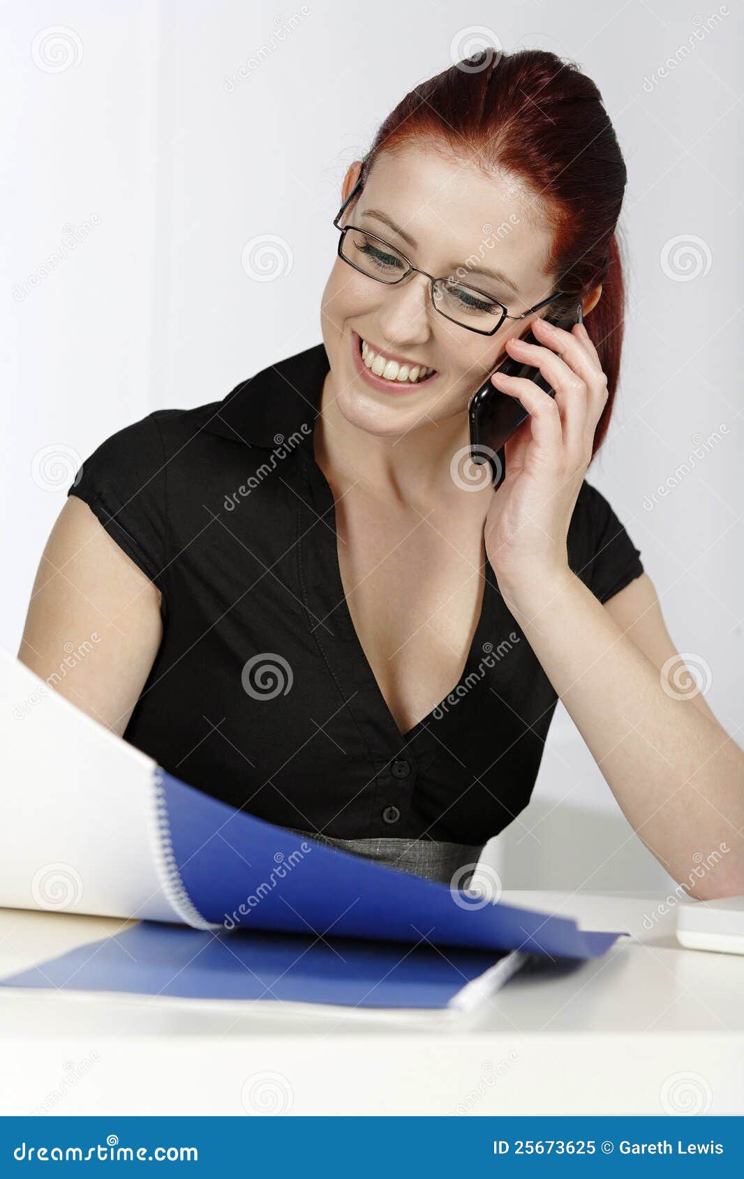 Woman on mobile at work stock image. Image of woman, documents - 25673625