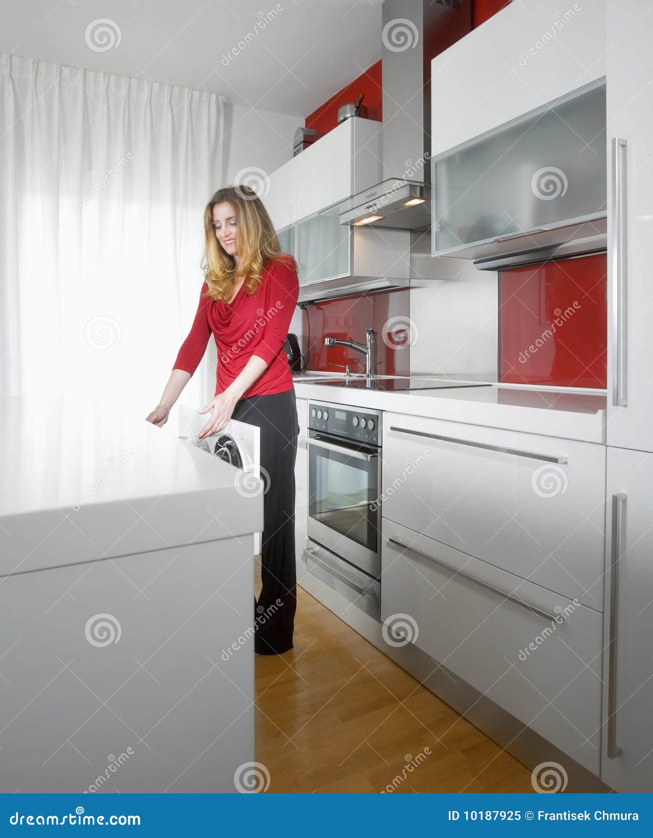 Woman in modern kitchen stock image. Image of clean, interior - 10187925