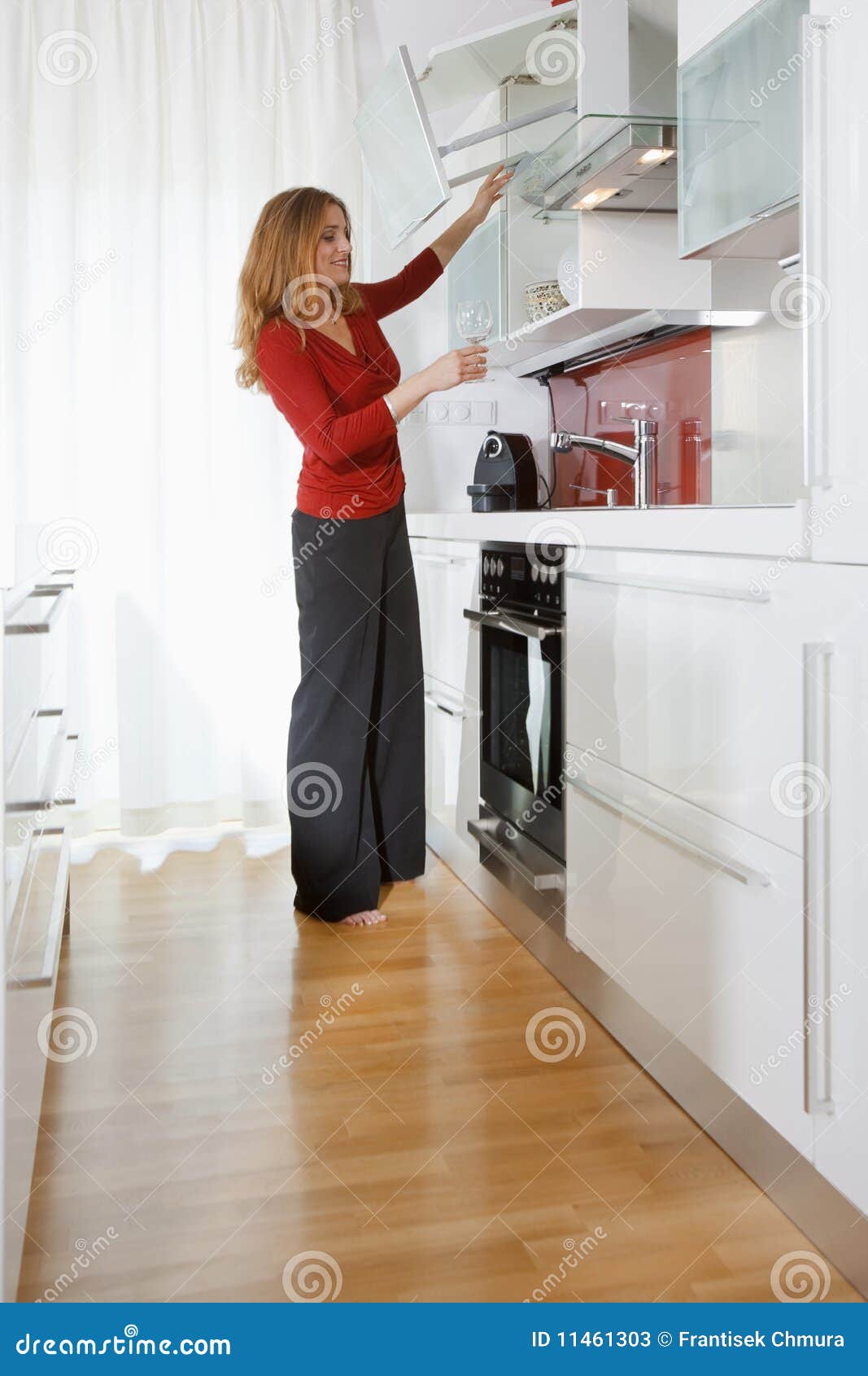 Woman in modern kitchen stock image. Image of girl, stove - 11461303
