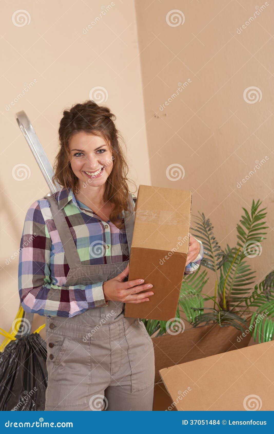 Woman with Moving Box in Her Hands Stock Photo - Image of start, moving ...
