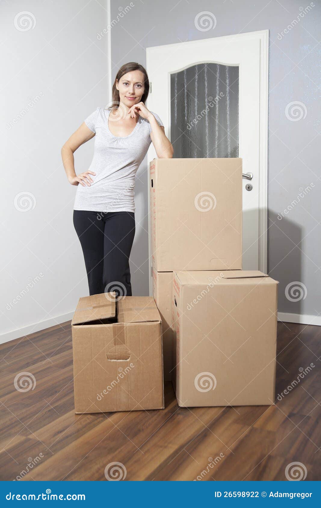Woman moving house stock photo. Image of holding, adult - 26598922