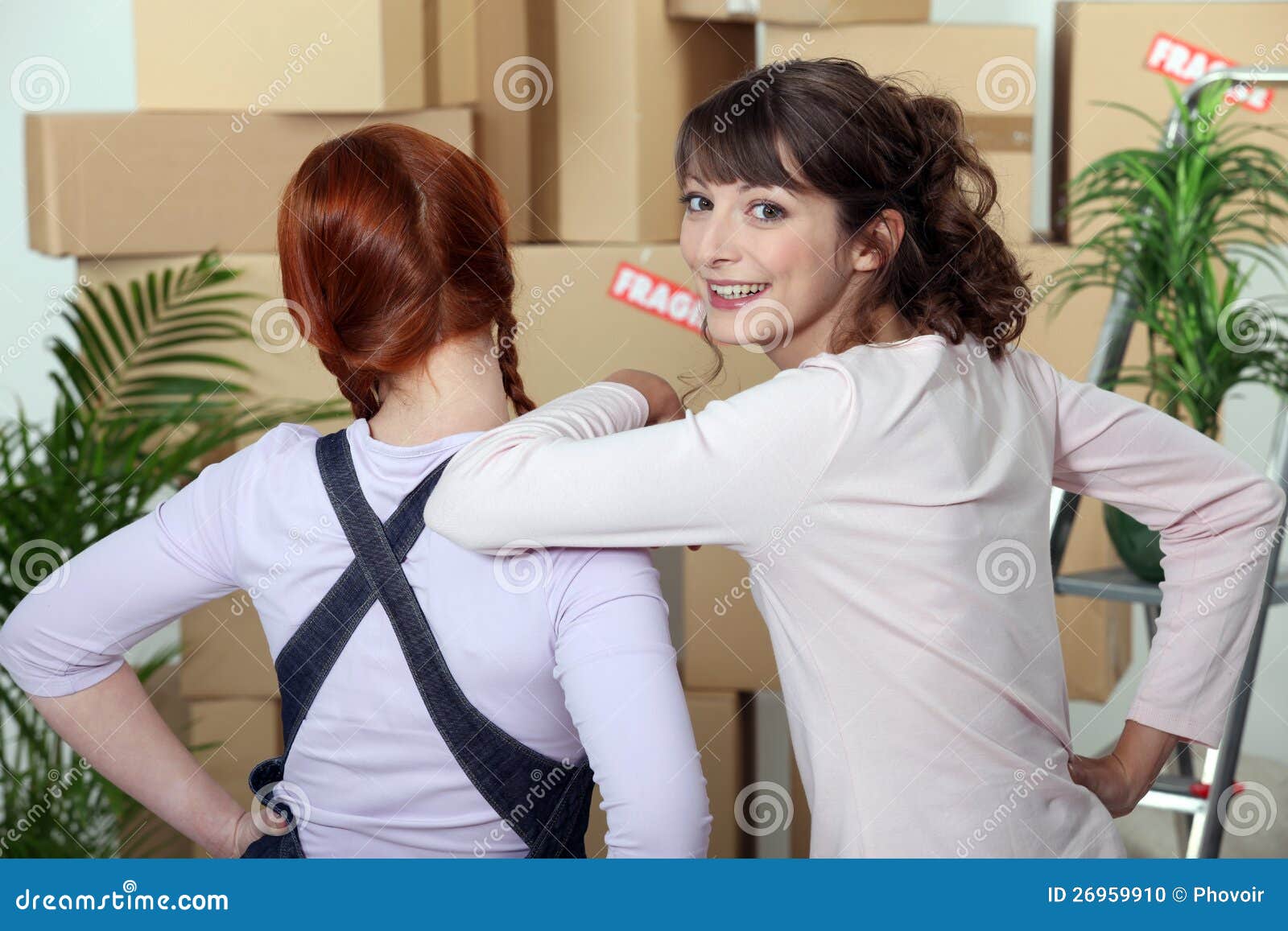 Woman moving house stock photo. Image of friends, cardboard - 26959910
