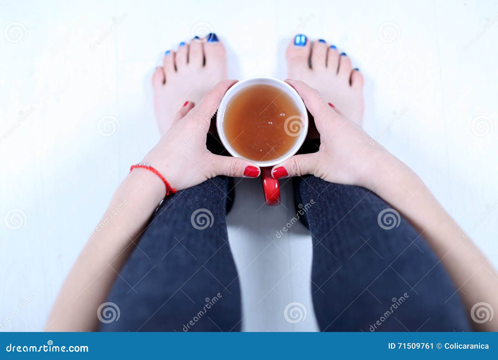 Woman with a mug of tea stock image. Image of girl, warm - 71509761